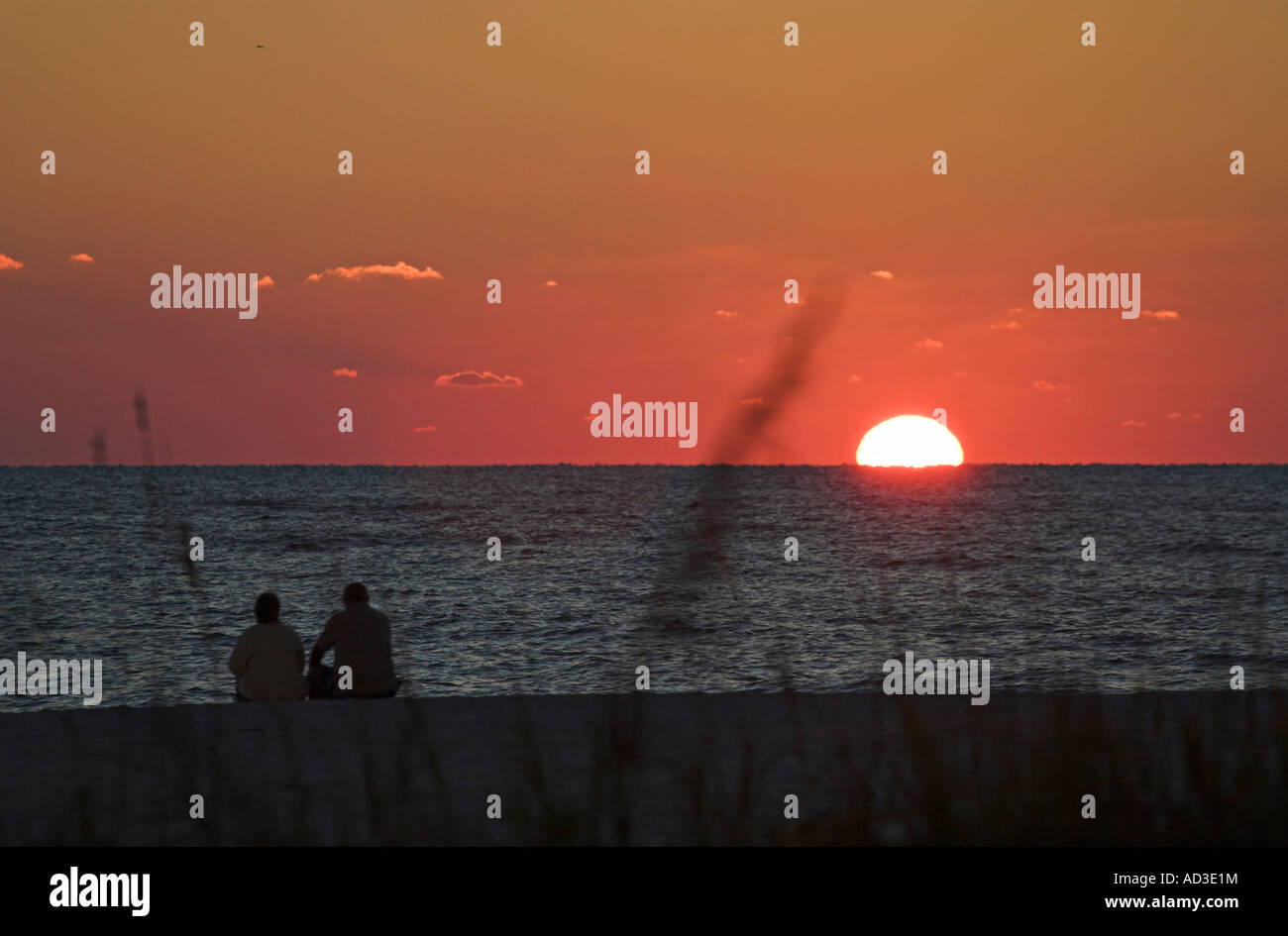 Watching the Sun Set Stock Photo - Alamy