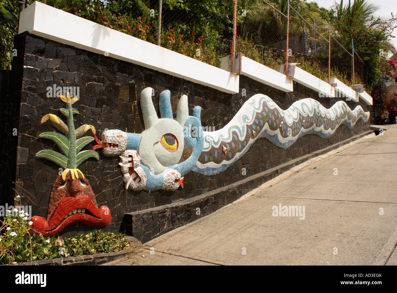 Feathered serpent mural by Diego Rivera on the front wall of the Casa ...