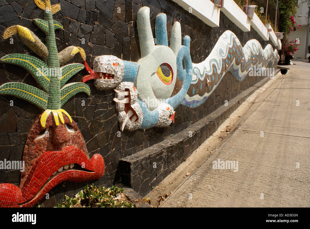Feathered serpent mural by Diego Rivera on the front wall of the Casa ...