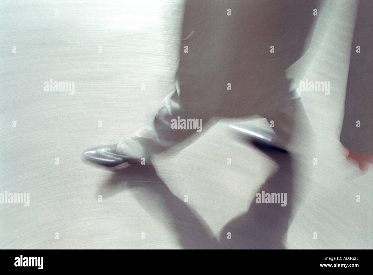 commuter s feet moving quickly blurred Stock Photo - Alamy