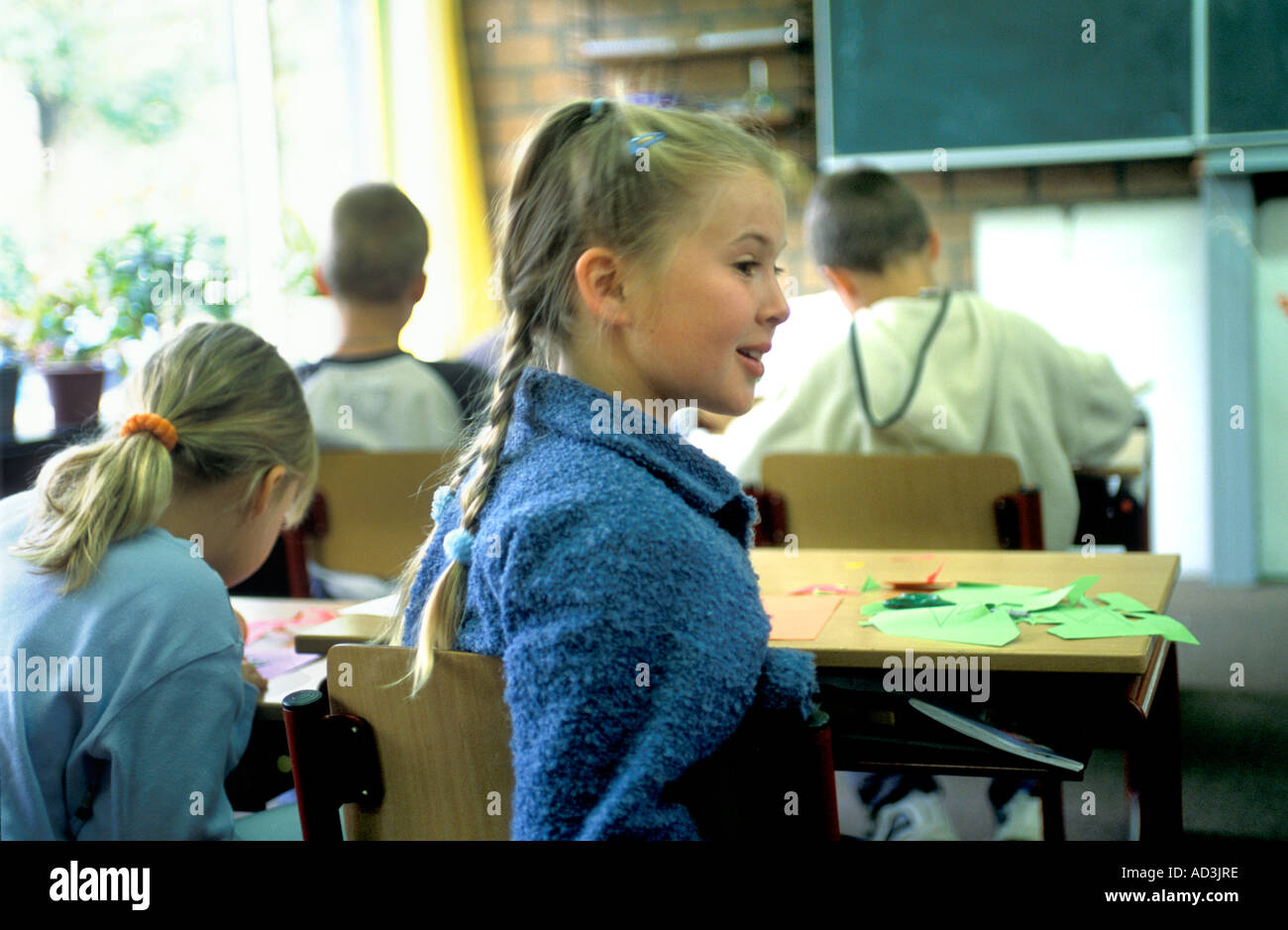 Child in classroom Stock Photo - Alamy