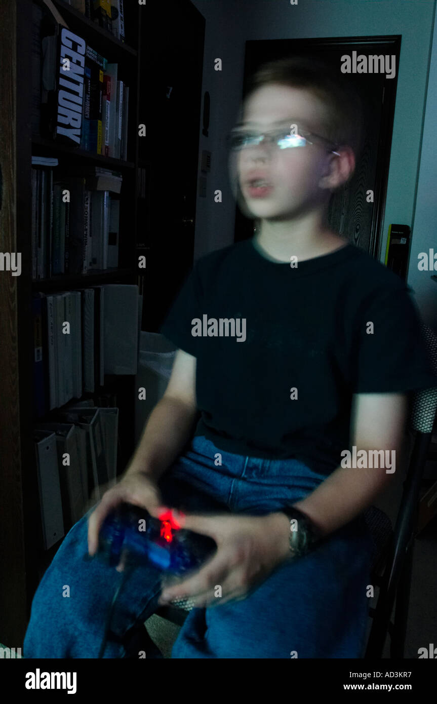 A young boy playing video games Stock Photo - Alamy