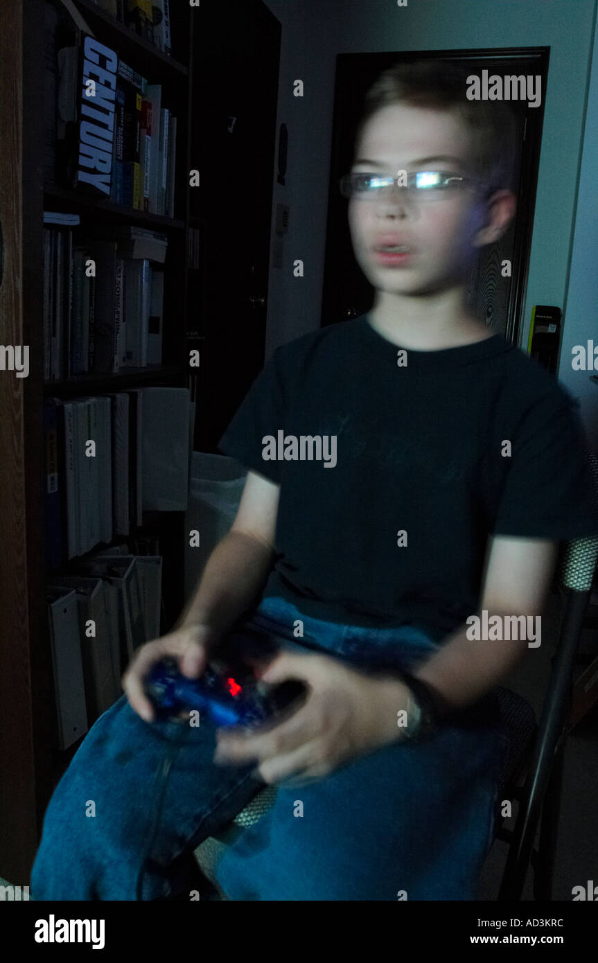 A young boy playing video games Stock Photo - Alamy