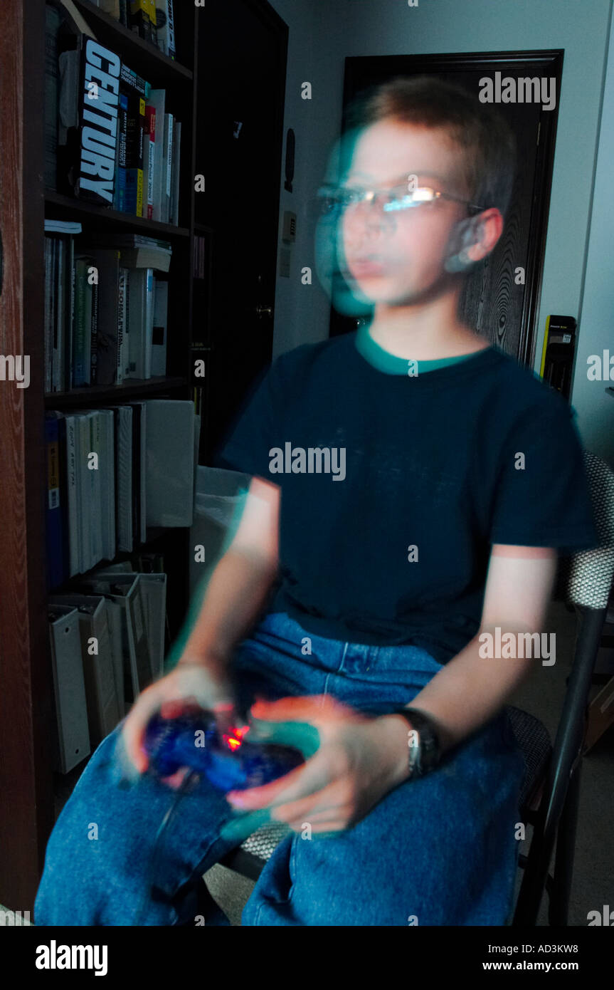 A young boy playing video games Stock Photo - Alamy