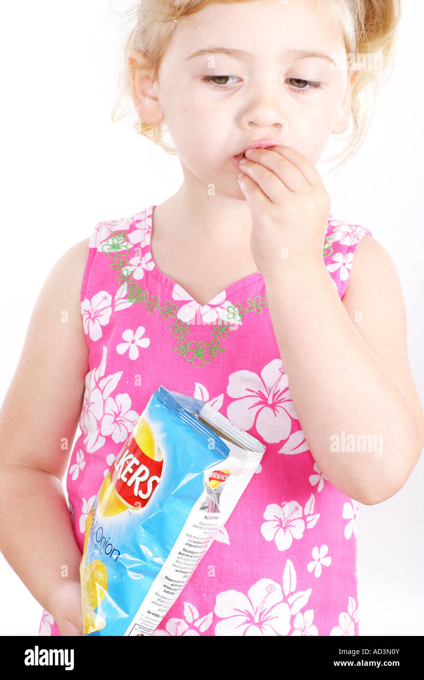 Young Girl Eating Cheese and Onion Crisps Model Released Stock Photo ...