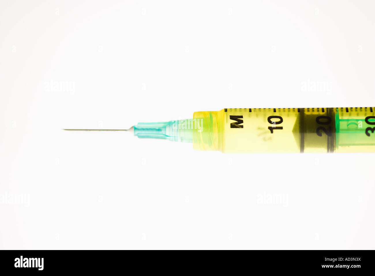 Hypodermic needle on white background Stock Photo - Alamy