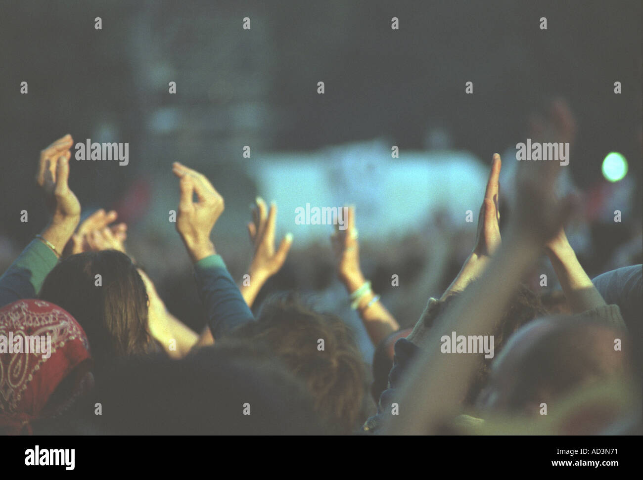 hands clapping and waving in crowd watching music concert Stock Photo ...