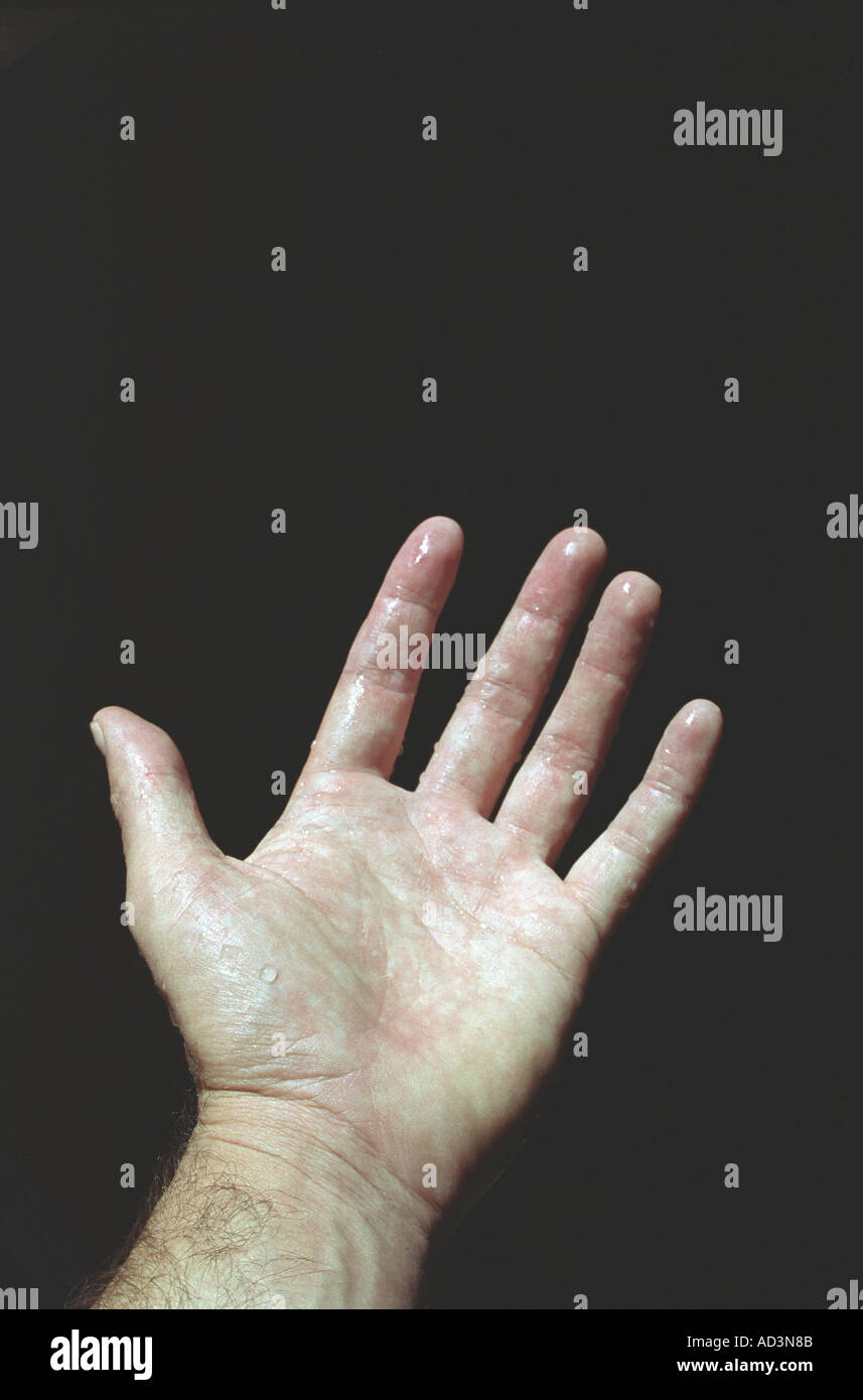 hand reaching out and dark background Stock Photo - Alamy