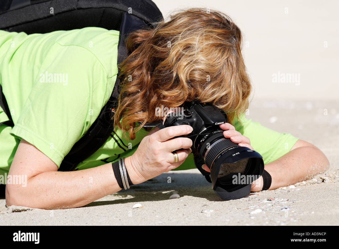 Photographer taking a close up shot Stock Photo - Alamy
