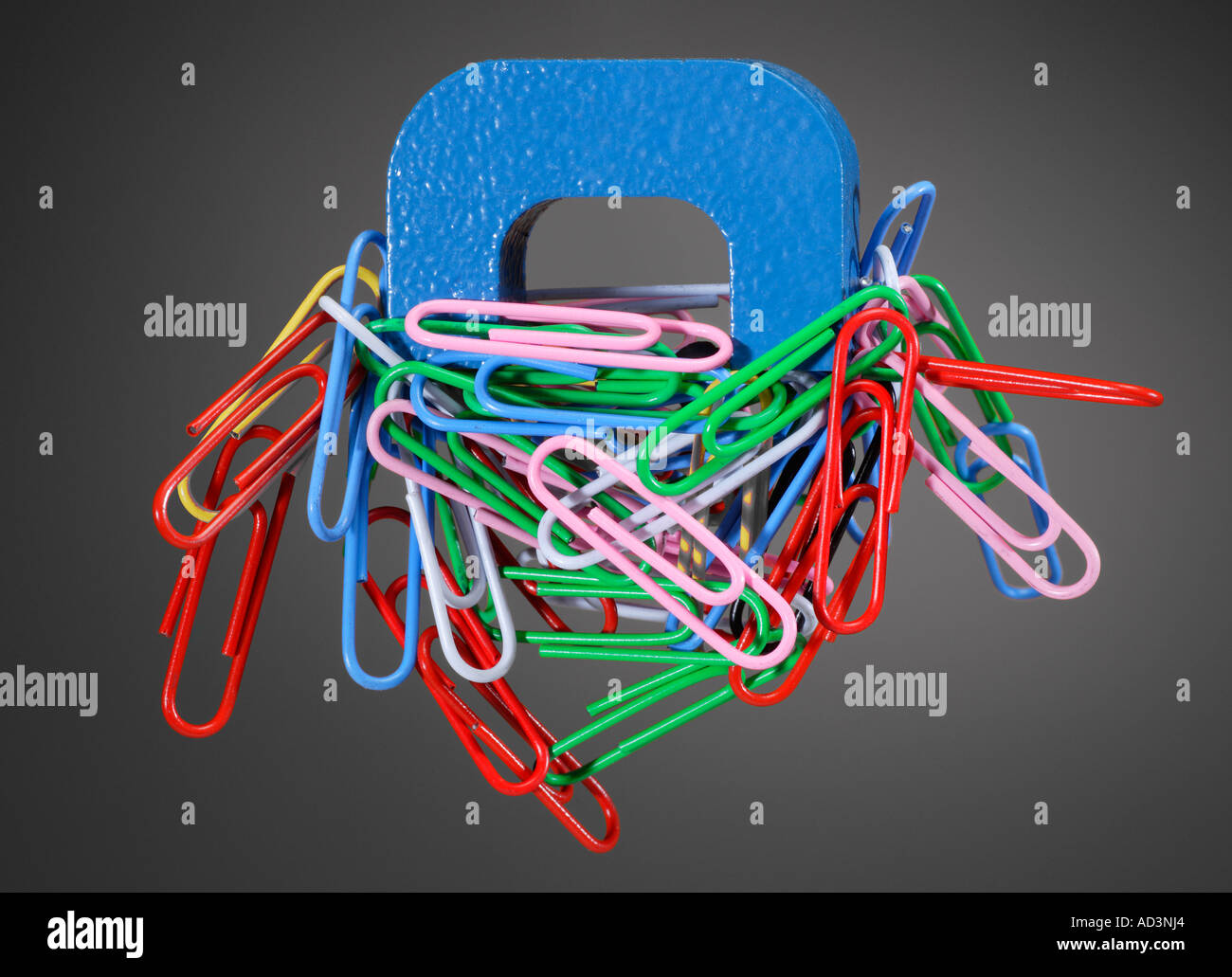 Alnico Horseshoe Magnet and Paper Clips Stock Photo - Alamy