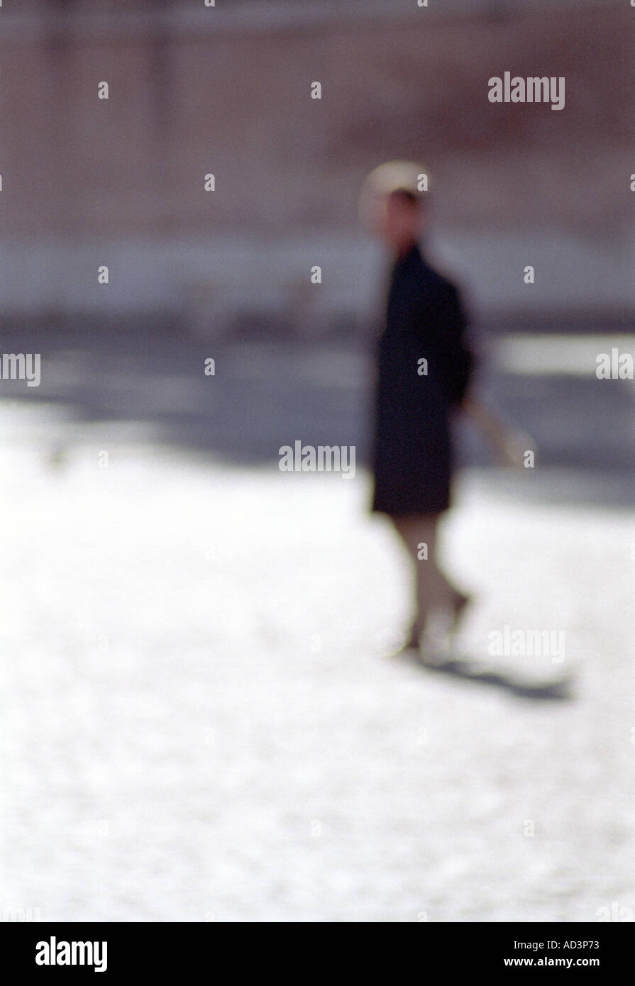abstract man walking on road Stock Photo - Alamy