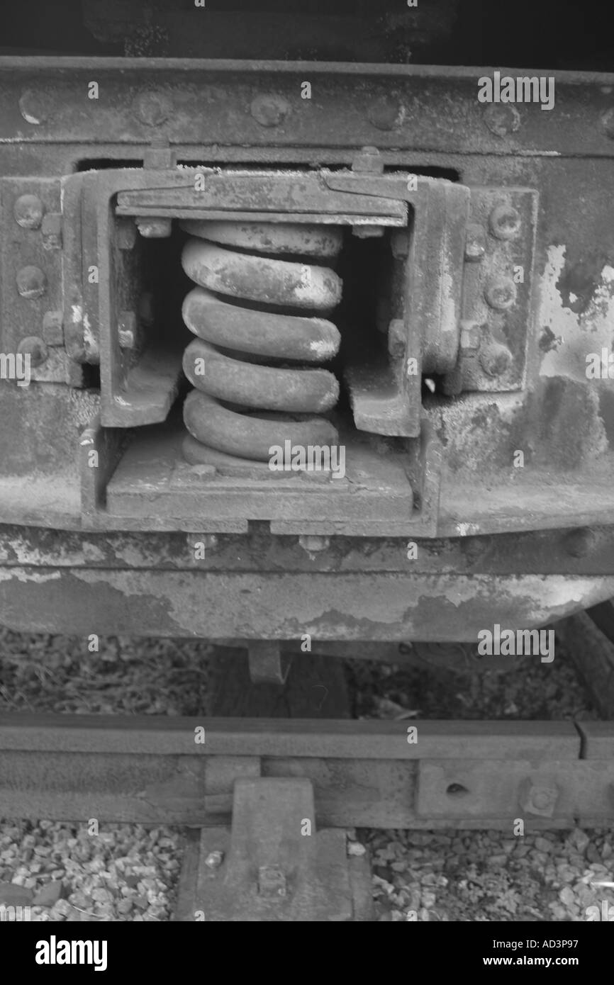 Black and white railway spring on carriage Stock Photo - Alamy