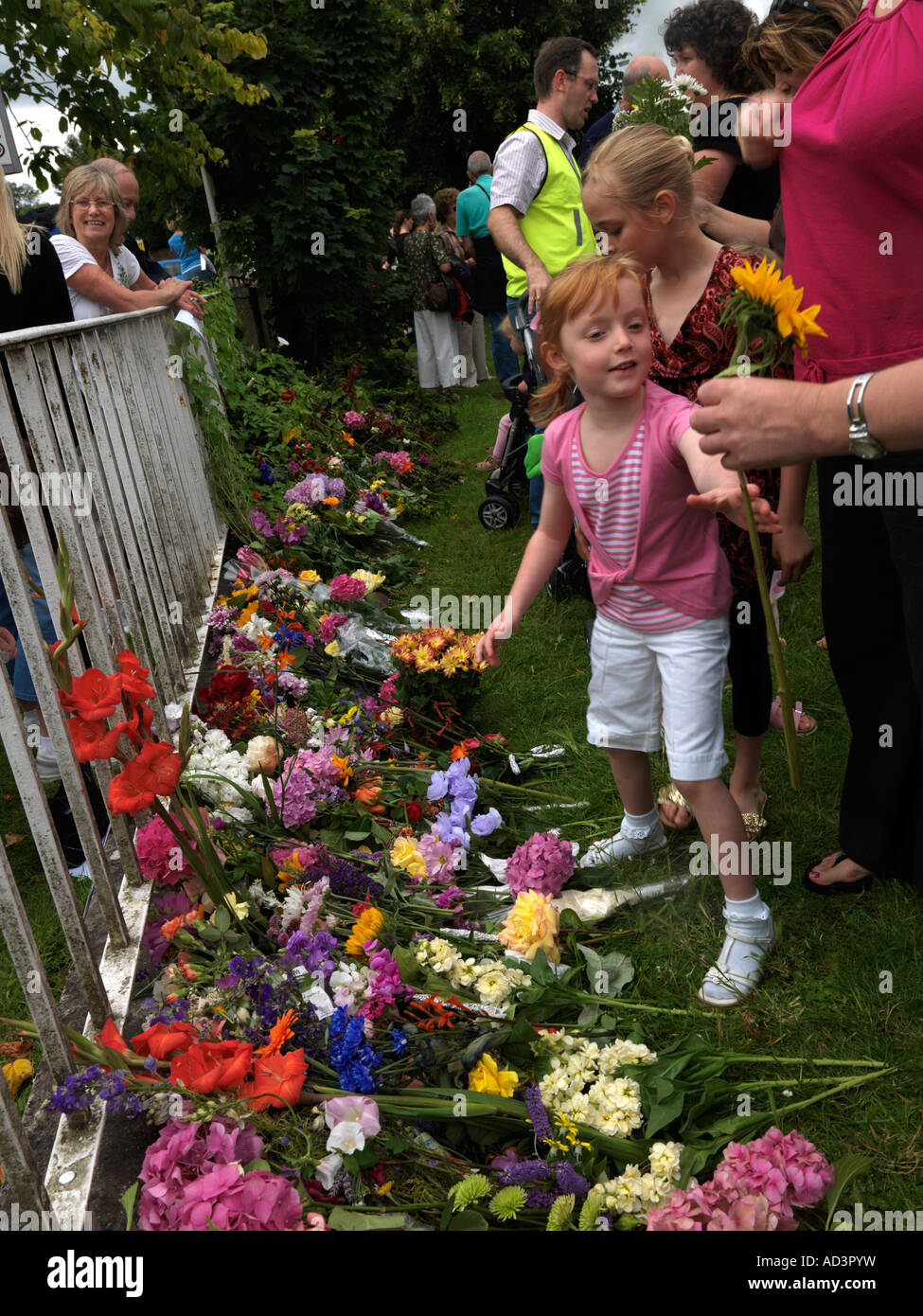 Children Laying a Flower on the Grass Outside Epsom District Hospital ...