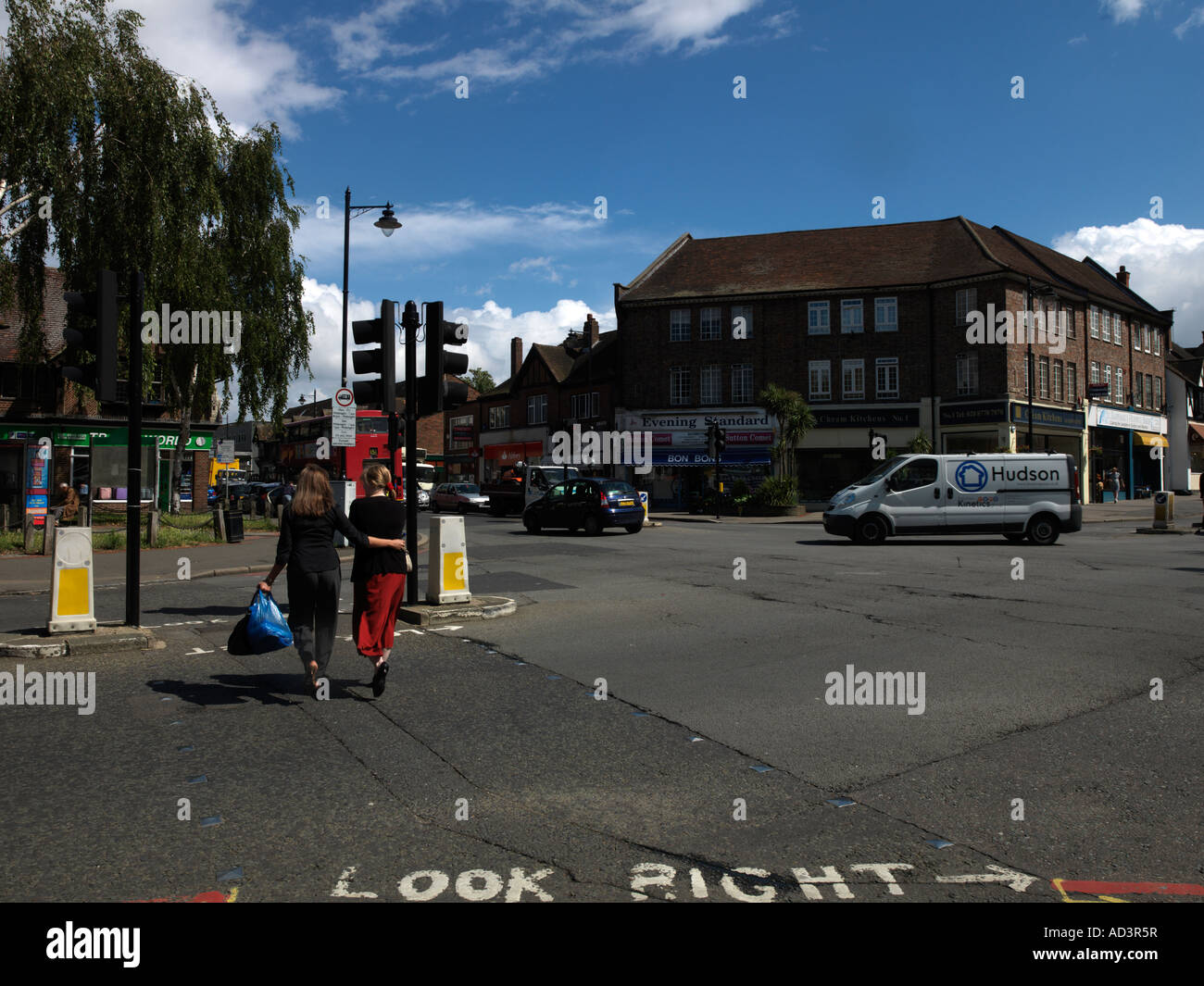 Two teenagers crossing the road hi-res stock photography and images - Alamy
