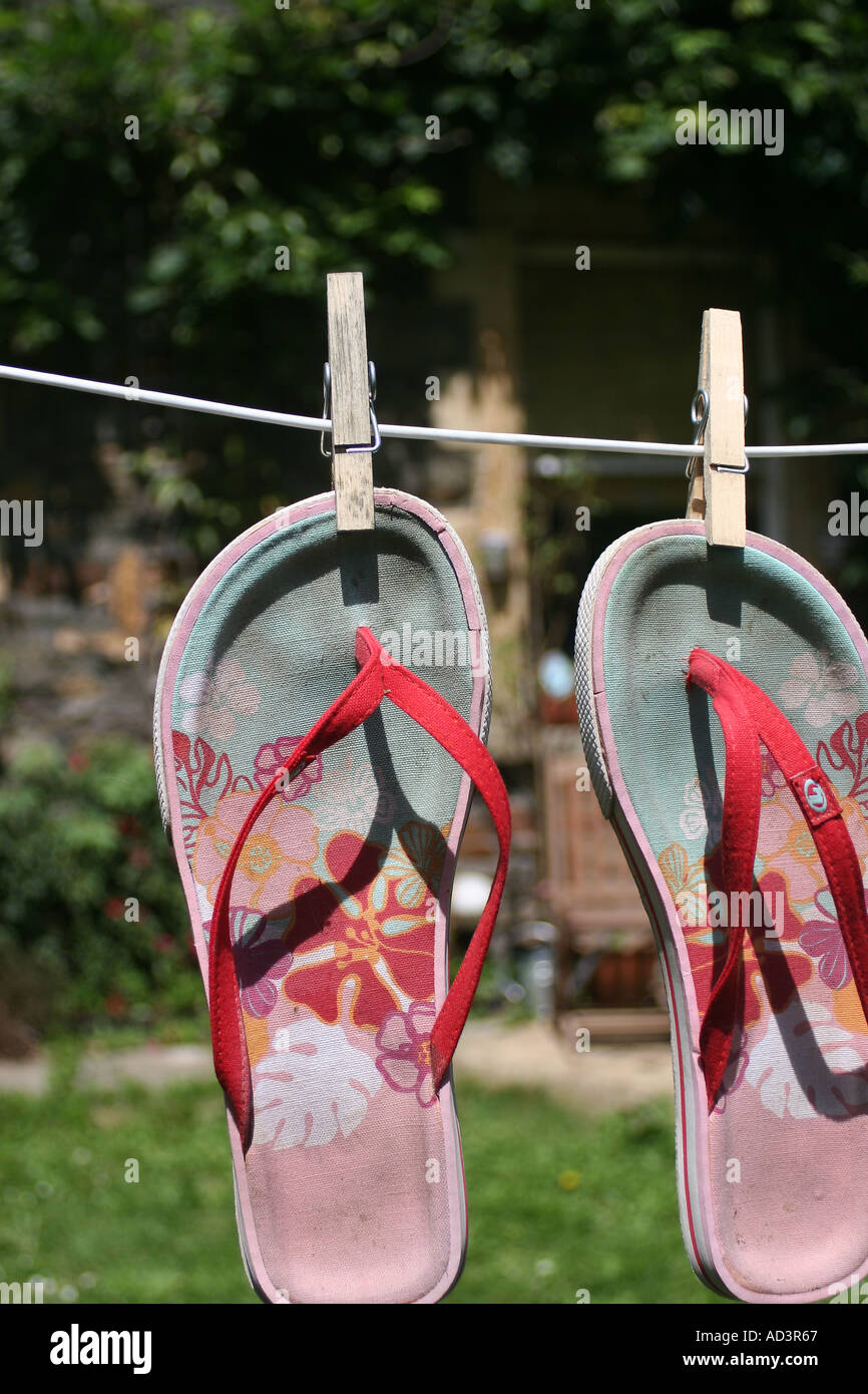 flip flops on washing line Stock Photo - Alamy