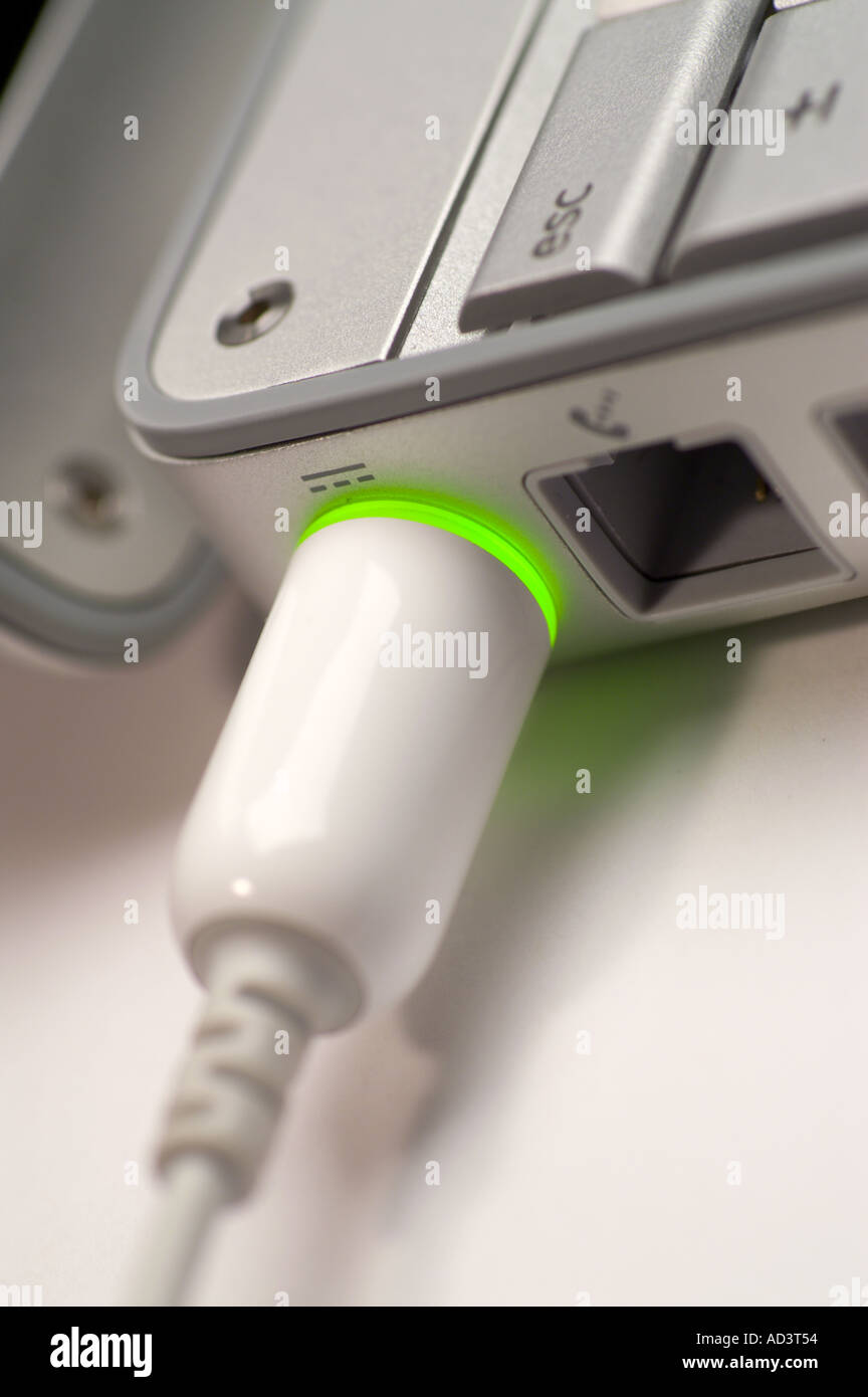 Laptop computer power plug battery charge Stock Photo - Alamy