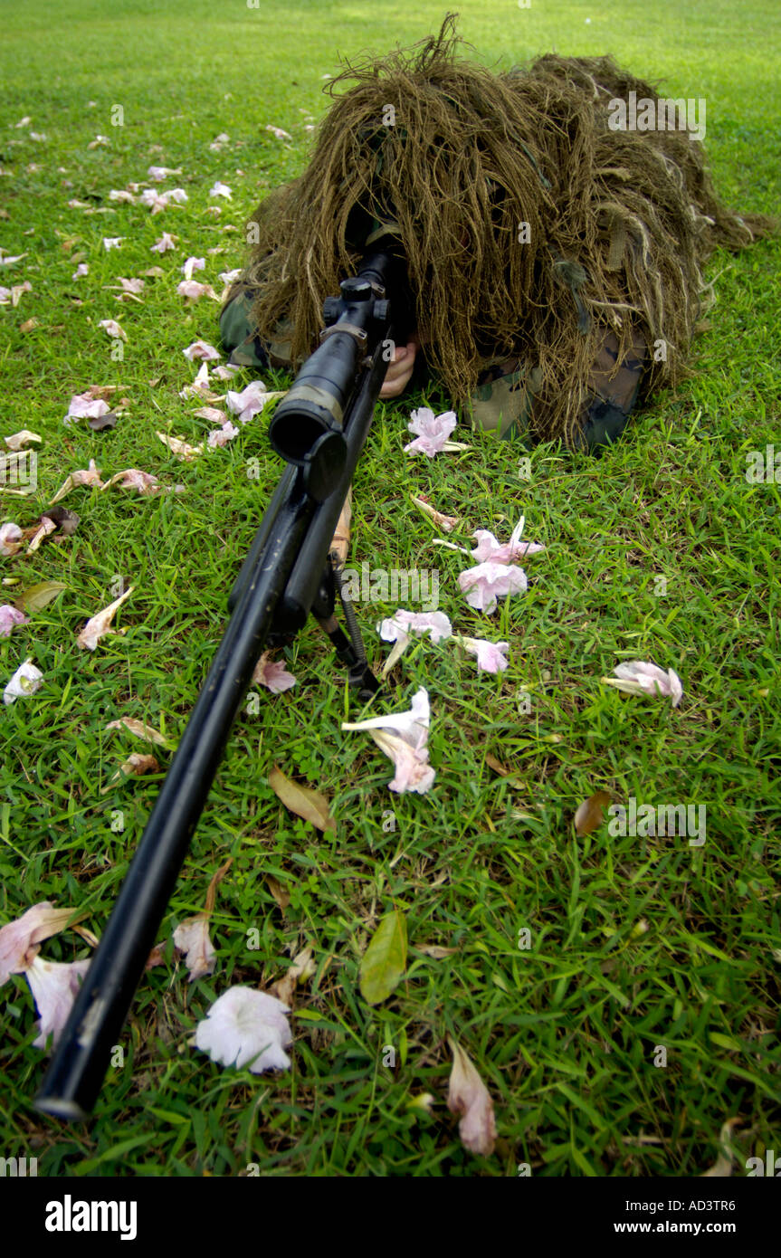 Staff Sergeant practices sniper tactics during a run-through exercise ...