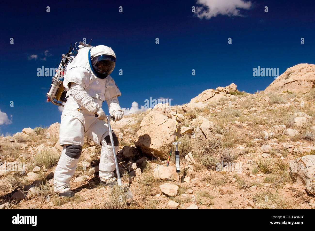 September 8-13, 2005, AZ - Astronaut stands beside a core sampling tool ...