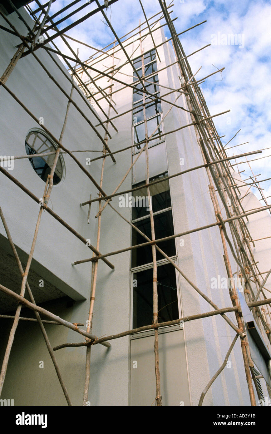 Bamboo scaffolding on building under construction in Singapore Stock ...