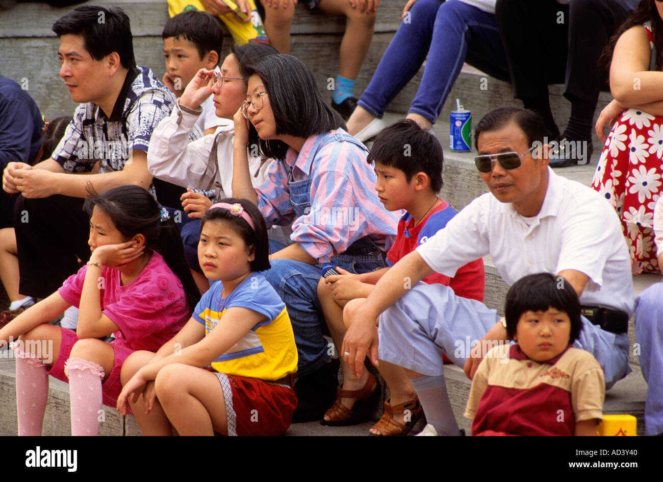 Chinese people sitting in a crowd Taiwan Stock Photo - Alamy
