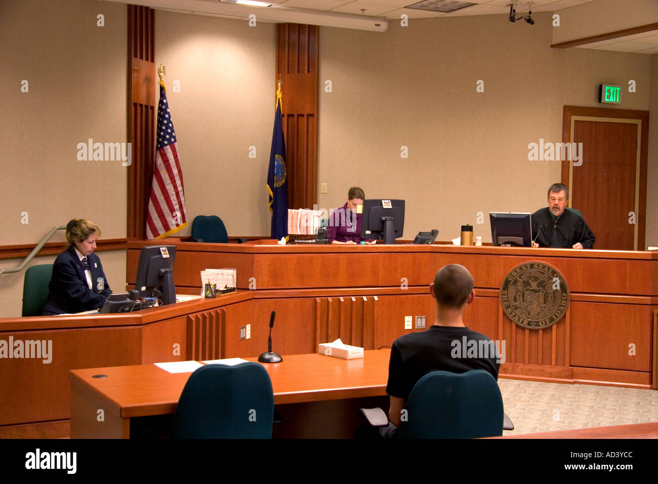 Court room scene with in Boise Idaho Criminal defendant sits with back ...