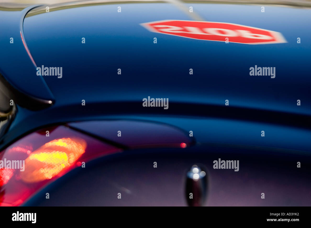 Stop sign at intersection Stock Photo - Alamy