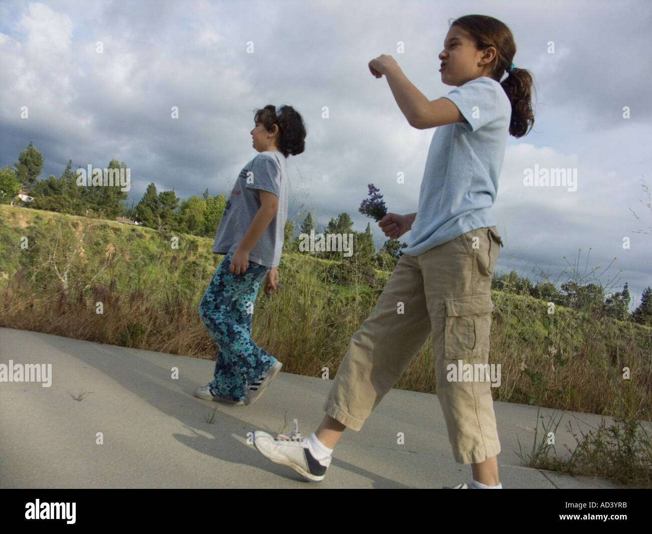Family takes walk together Stock Photo - Alamy