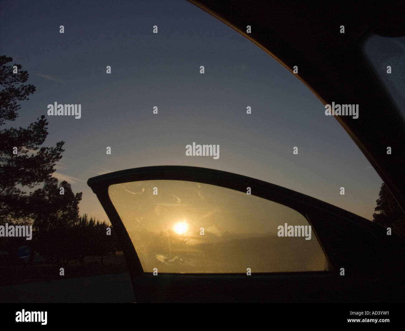 Sunrise color seen through car window Stock Photo - Alamy