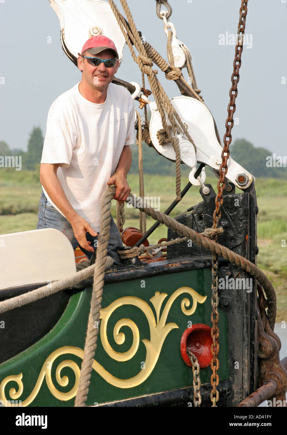 Man pulling an anchor hi-res stock photography and images - Alamy