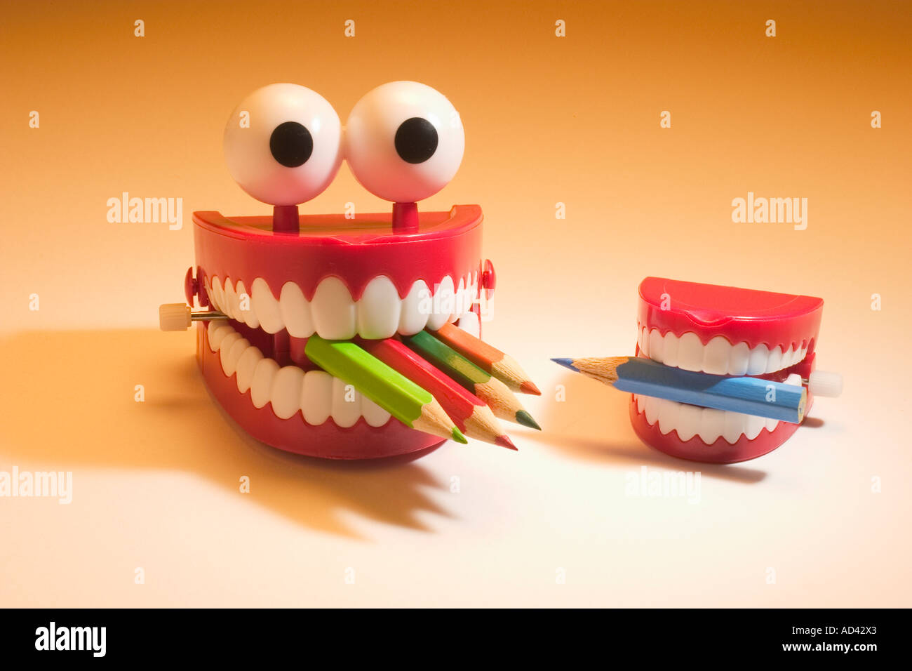 Chattering Teeth with Colour Pencils Stock Photo - Alamy