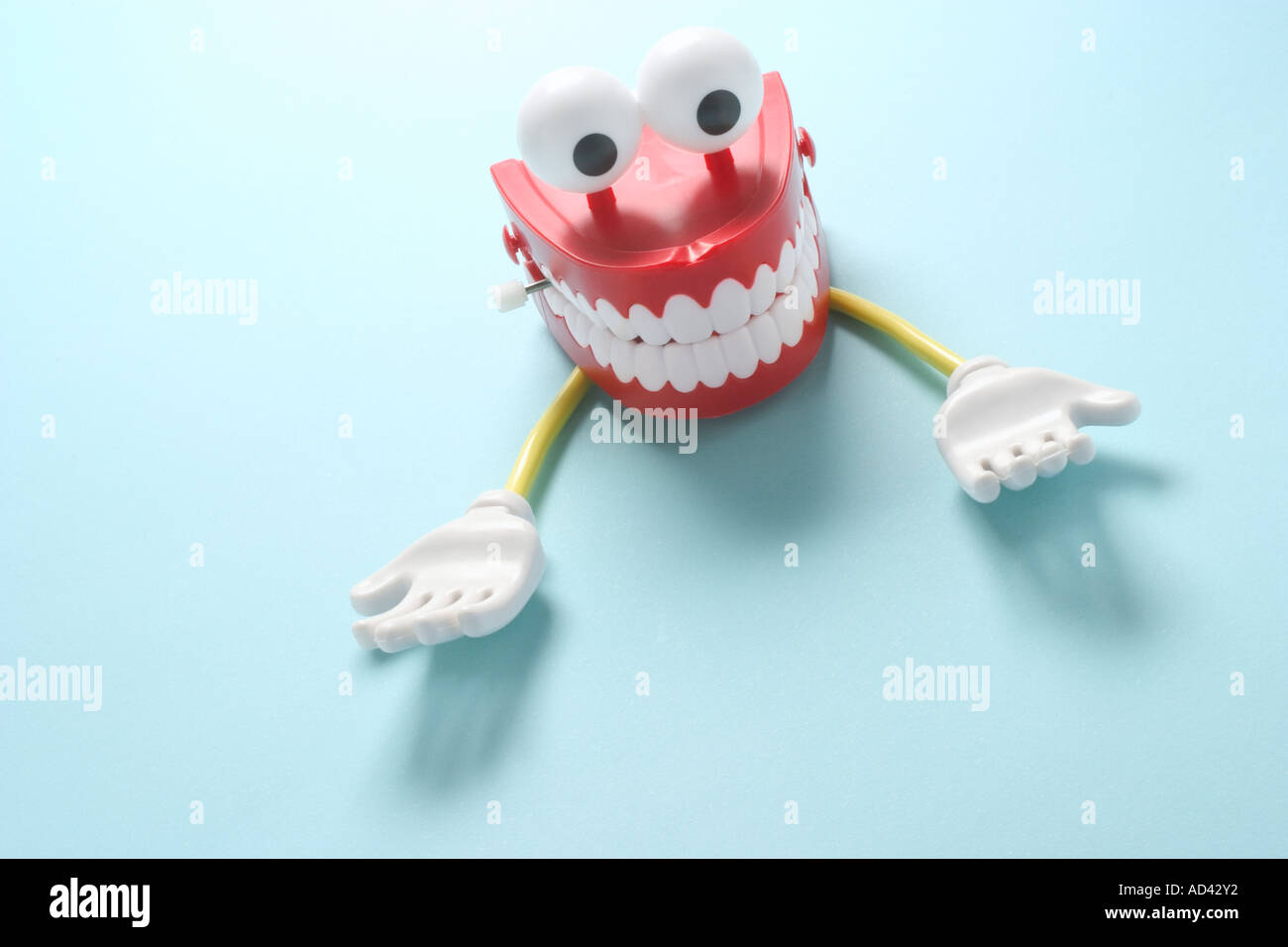 Chattering Teeth Toy with Plastic Hands Stock Photo - Alamy