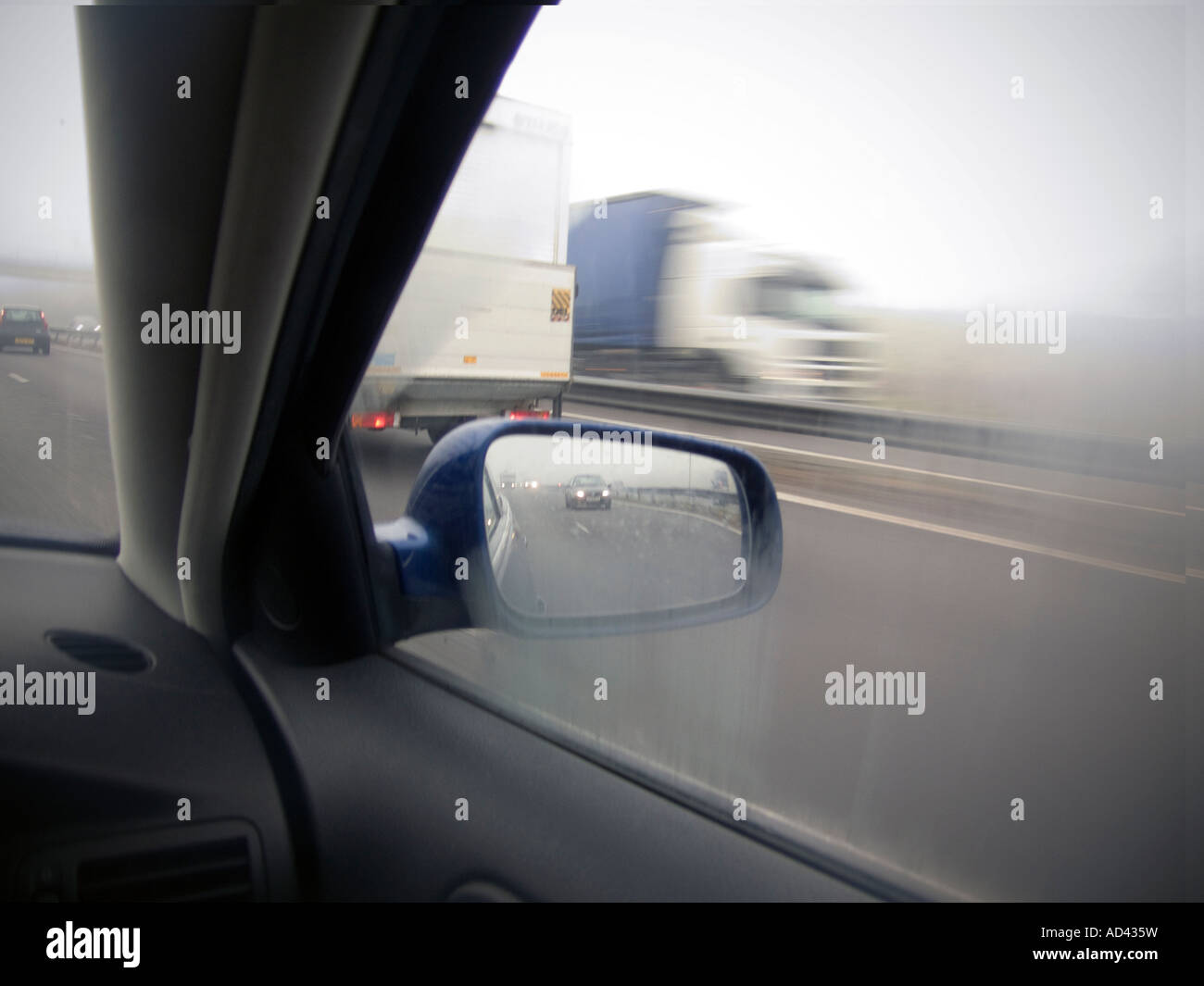 Lorry driving in fog hi-res stock photography and images - Alamy
