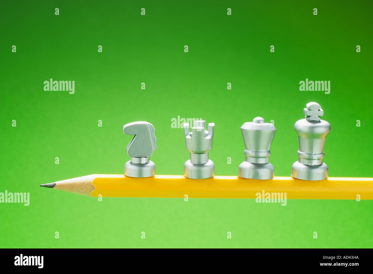 Chess Pieces on Pencil Stock Photo - Alamy