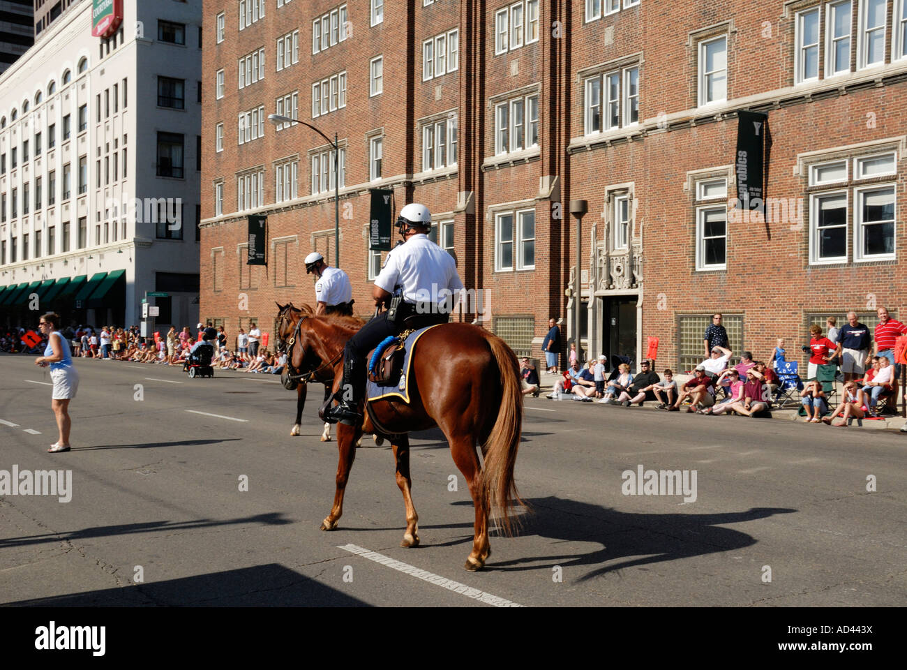 Policeman on horse crowd control in parade Stock Photo - Alamy