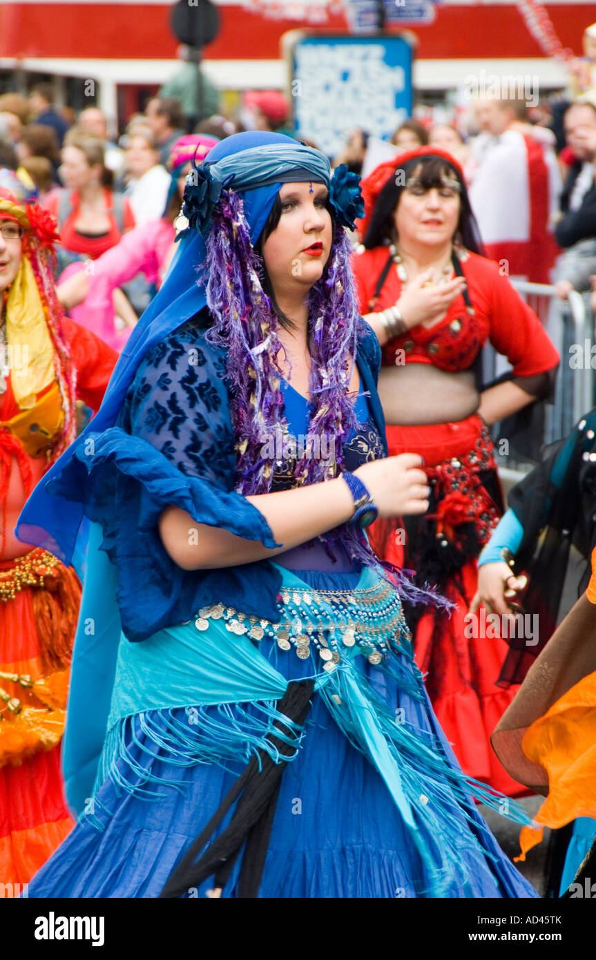 Woman dancing in The St George parade and festival Piccadilly Gardens ...