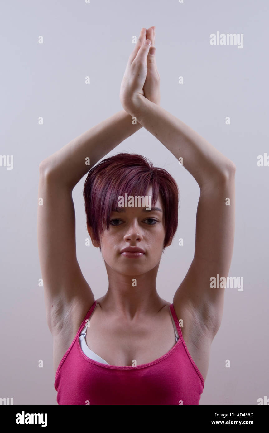 Woman stretching her arms Stock Photo - Alamy