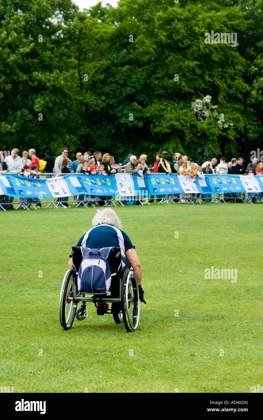 Disabled Senior woman racing on a wheelchair Stock Photo - Alamy