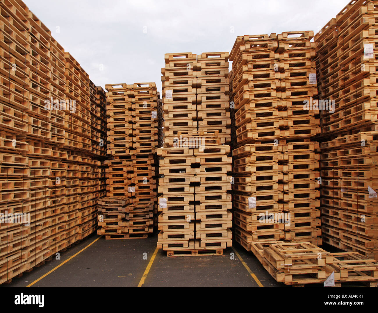 Piled wooden pallets Stock Photo - Alamy