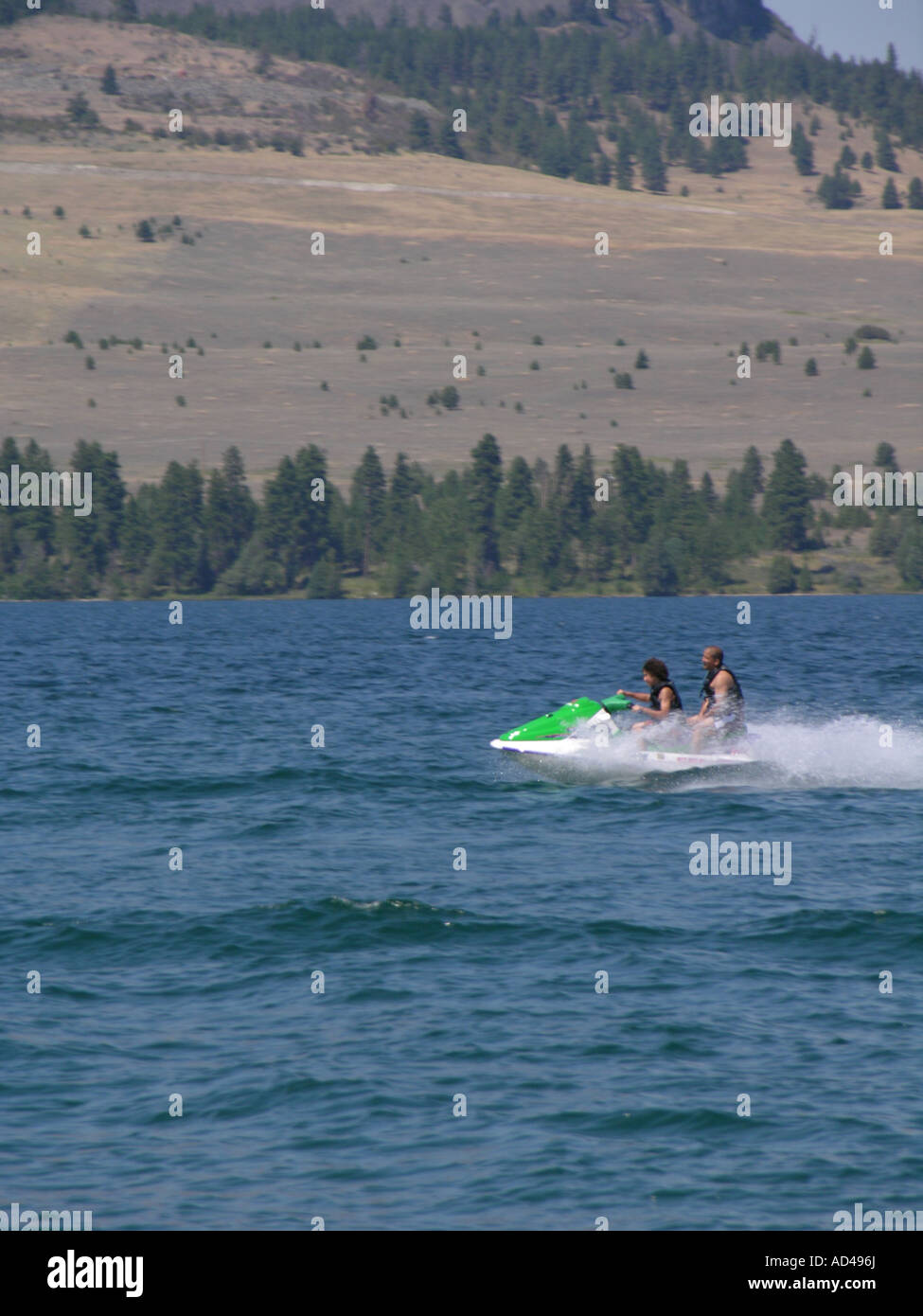 People riding Jet Ski Stock Photo - Alamy
