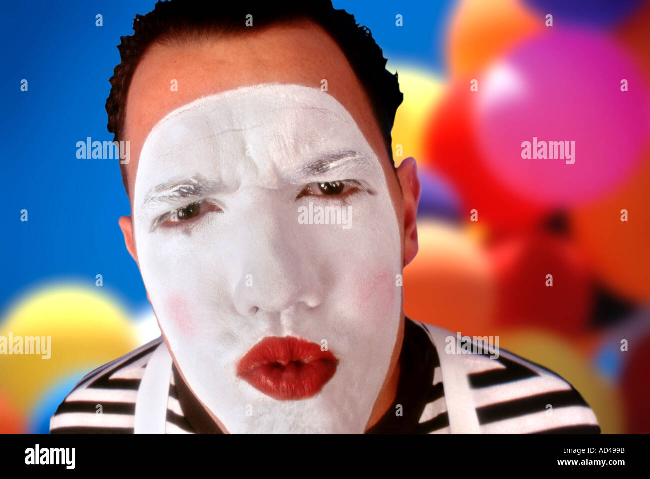 Mime with white painted face with expressive look Stock Photo - Alamy