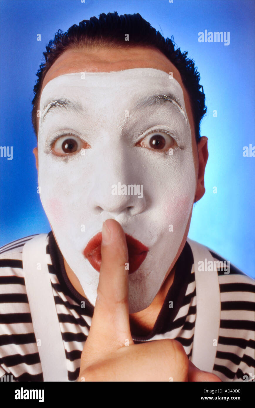 Mime with white painted face with expressive look Stock Photo - Alamy