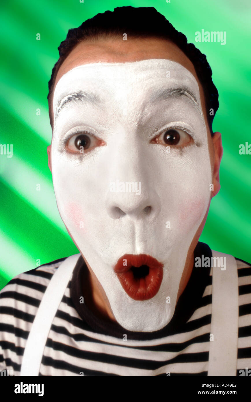 Mime with white painted face with expressive look Stock Photo - Alamy