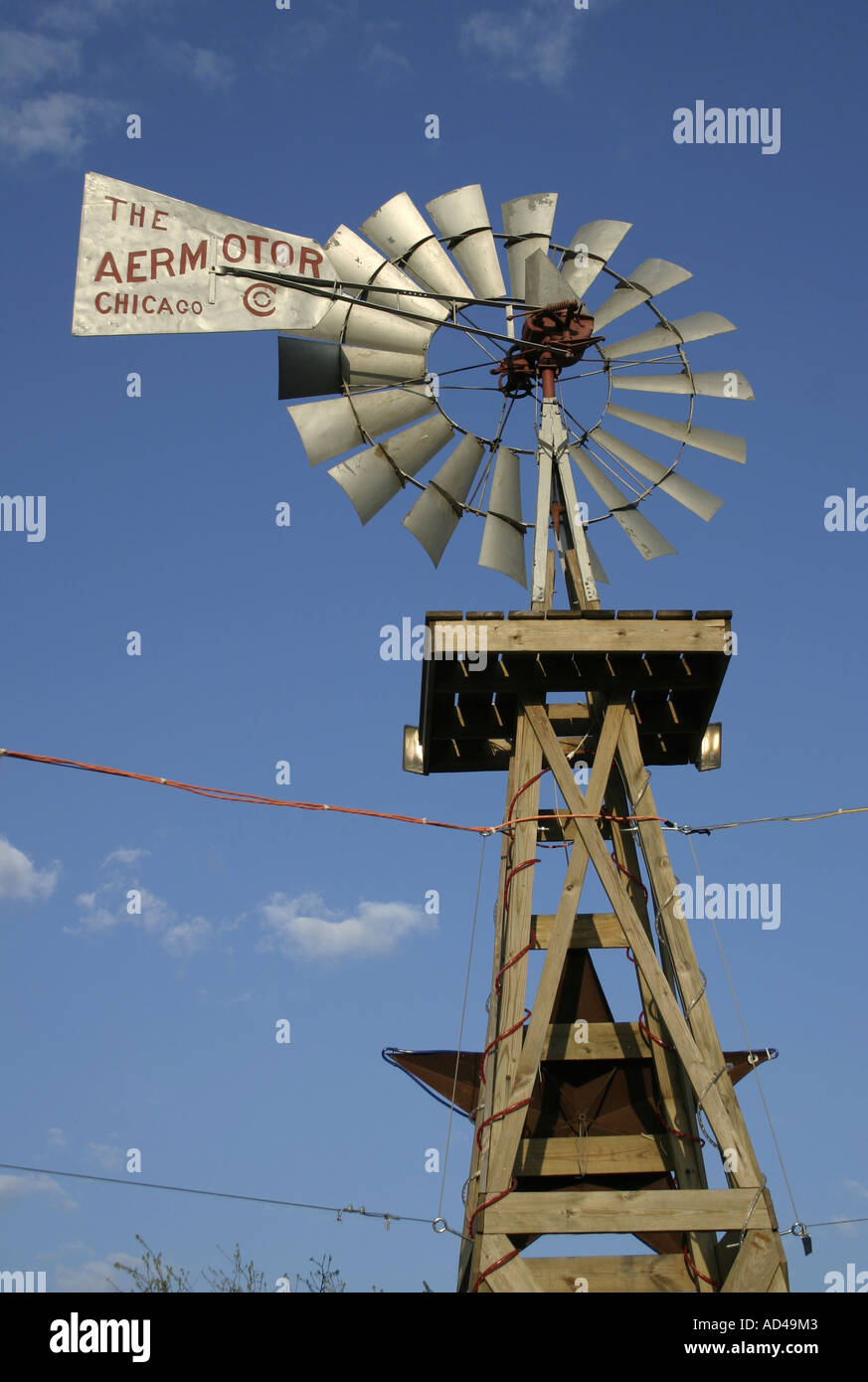 an old style windmill built by the Aermotor company of Chicago Stock ...