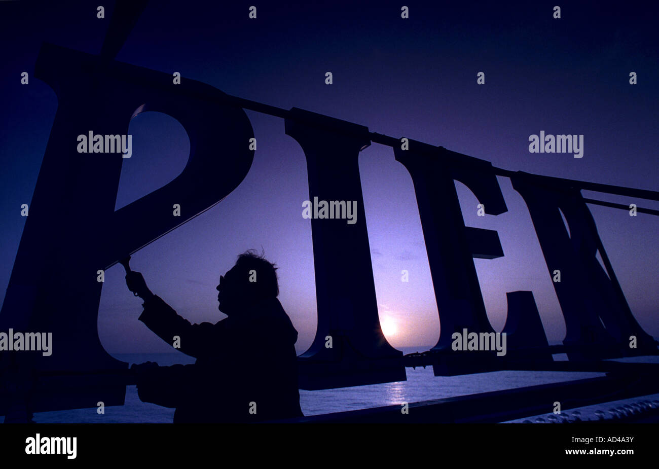 Brighton Palace Pier maintenance engineer at work Stock Photo - Alamy