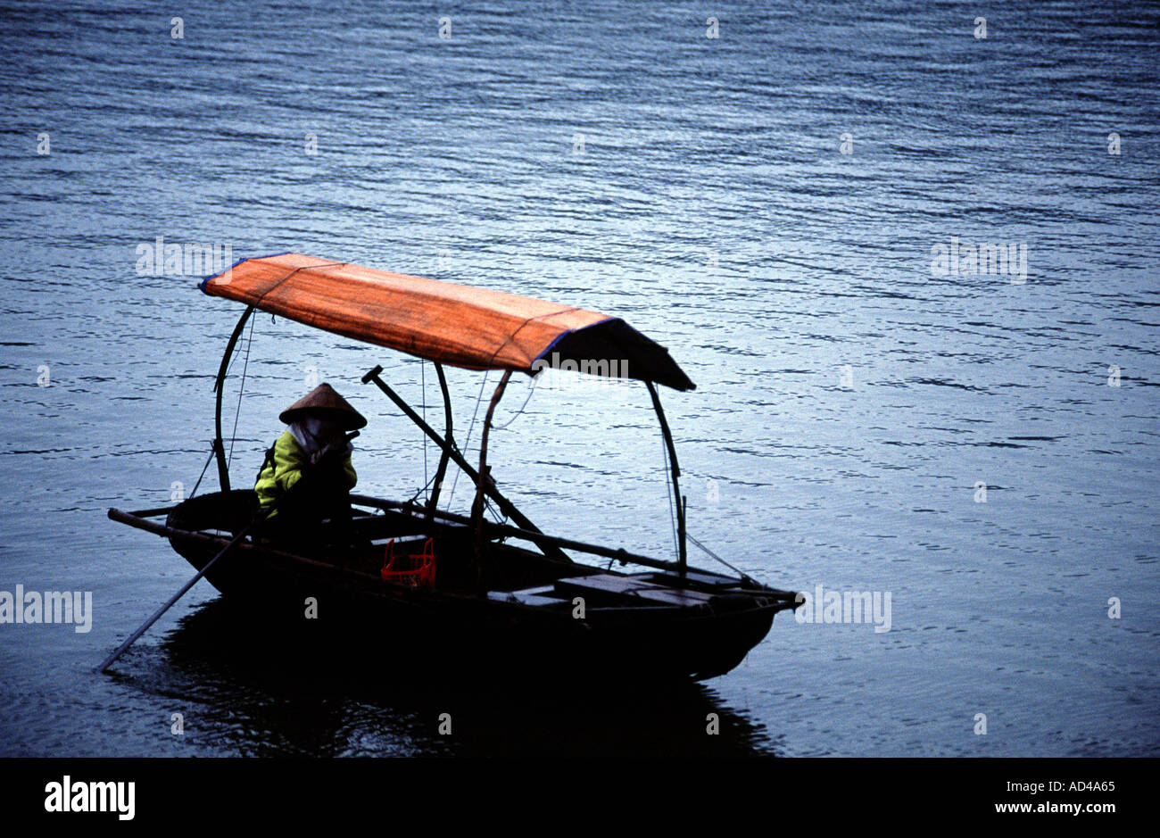 Red in the figure in the boat hi-res stock photography and images - Alamy