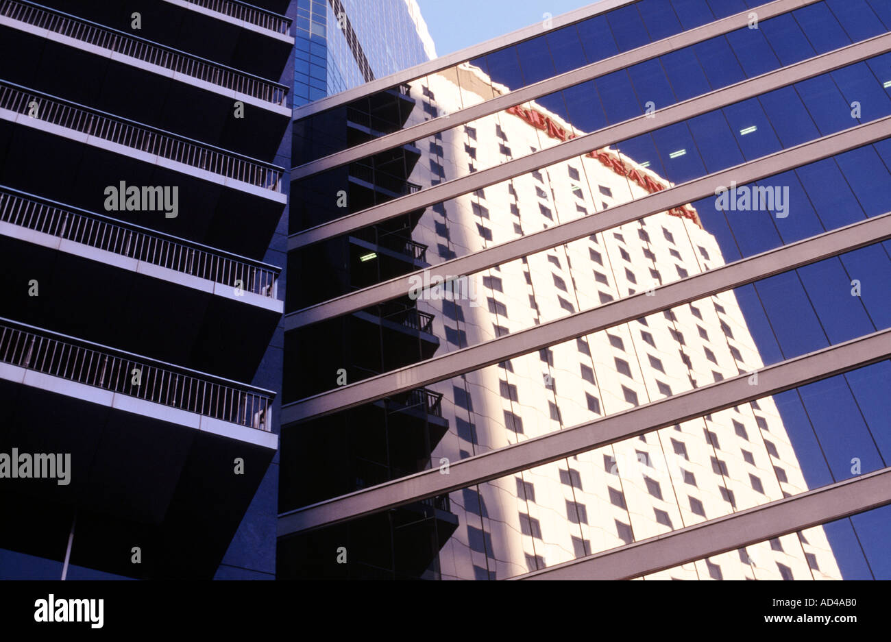 Looking up the side of a corporate office building with another ...