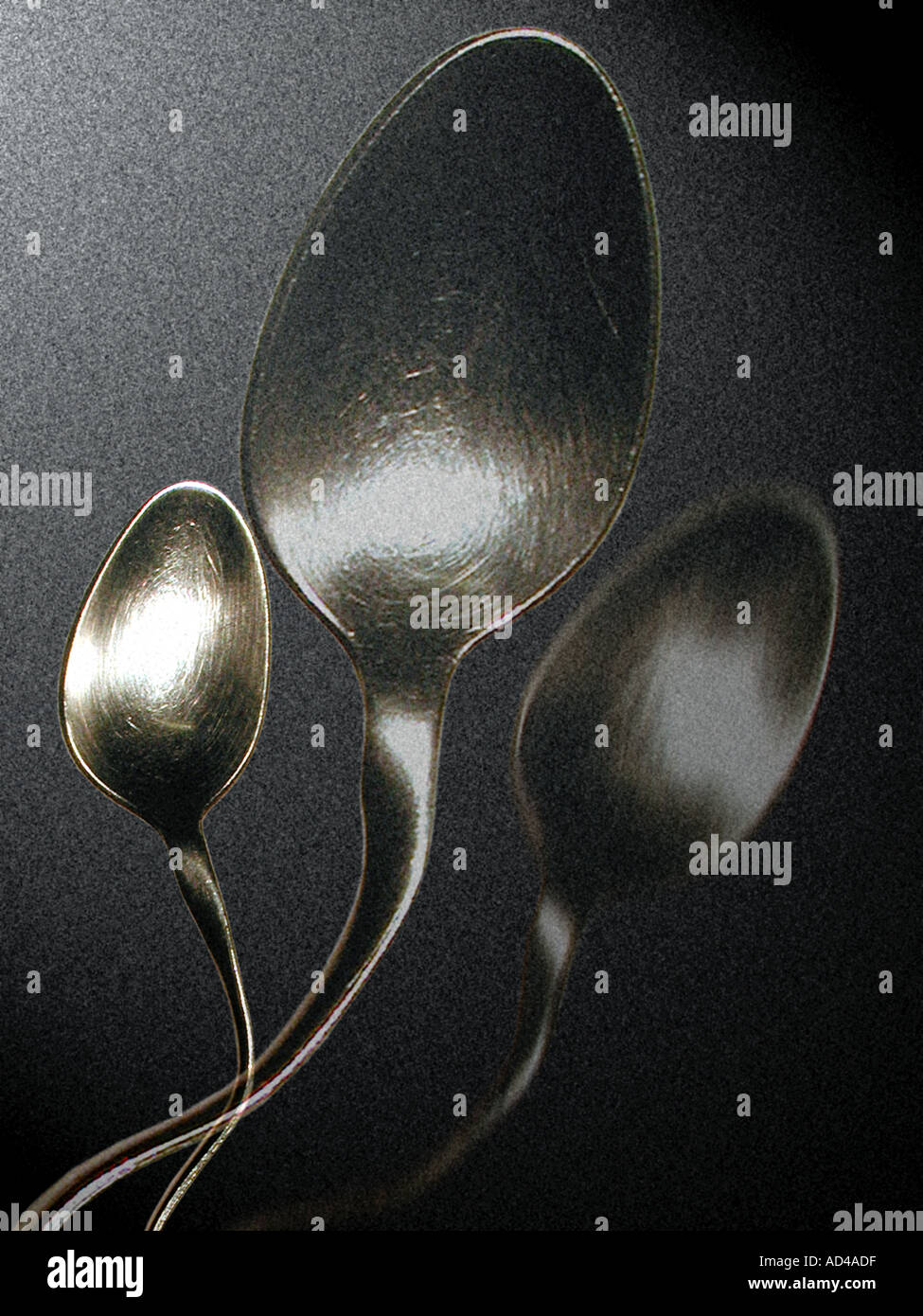 Bendy spoons psychic powers Stock Photo - Alamy