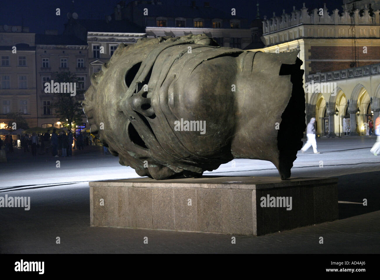 Statue of a man's face in Krakow, Poland Stock Photo - Alamy