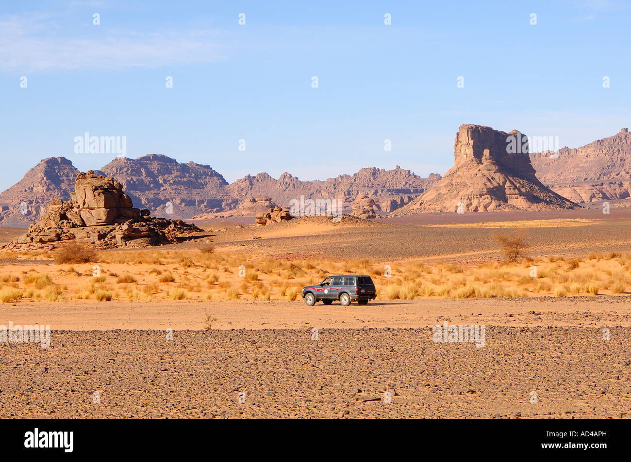 Jeep in the hamada desert, Acacus Mountains, Sahara, Libya Stock Photo ...