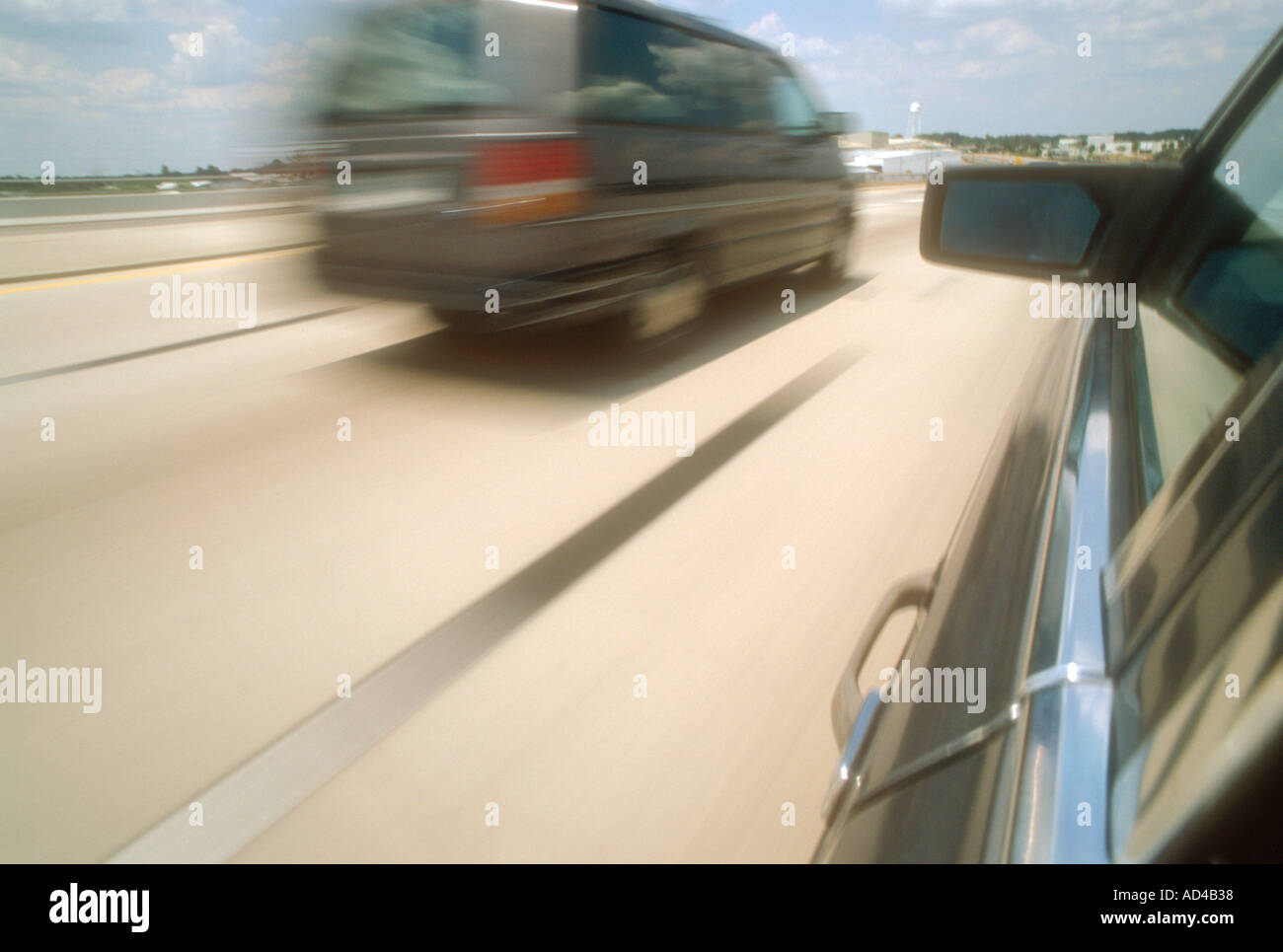 traffic speeding on expressway Stock Photo - Alamy